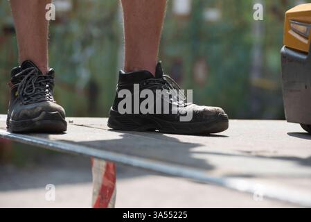 Work shoes in prevention of accidents Stock Photo - Alamy