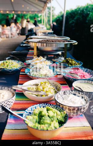 A cheese buffet is set up at an event Stock Photo - Alamy