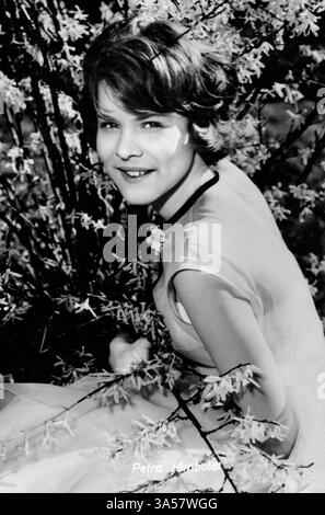 An antique postcard featuring German actress Marianne Koch, published ...