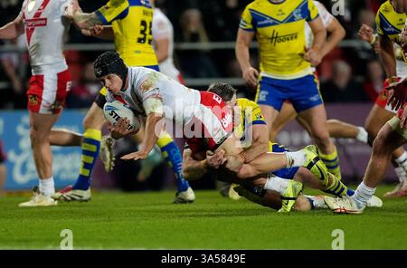 Warrington Wolves' Lachlan Fitzgibbon is tackled by Leigh Leopards ...