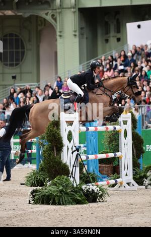 Megane MOISSONNIER of France with Crooner tame during the Grand Prix ...