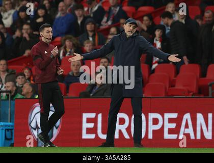 England head coach Thomas Tuchel, center, congrats to his players after ...