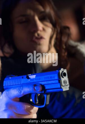 pistol, a handgun for shooting at an attacker or target pistol, a ...