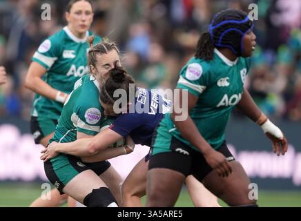 Ireland's Eve Higgins is tackled by France's Yllana Brosseau during the ...