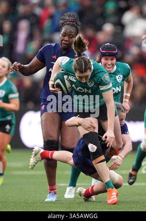 Ireland's Eve Higgins is tackled by France's Yllana Brosseau during the ...
