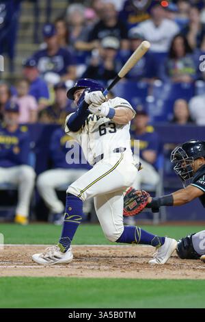 Milwaukee Brewers' Caleb Durbin (21) celebrates after driving in the ...