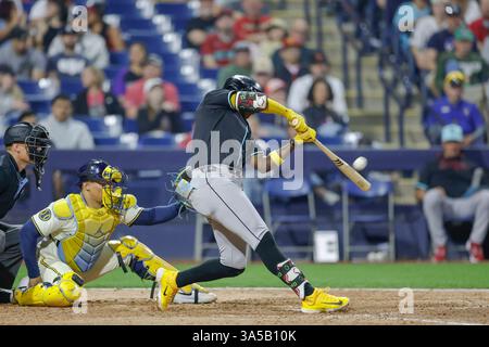 Milwaukee Brewers' Jake Bauers hits a single during the third inning of ...