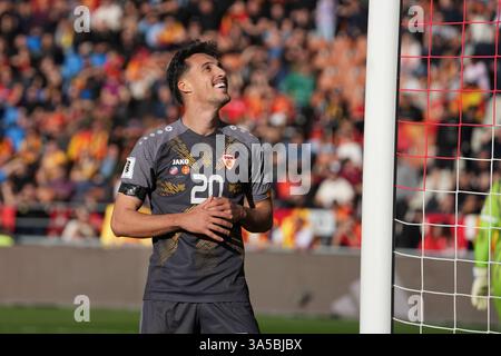 20, Bojan Miovski of North Macedonia plays the ball past 22, Josh ...