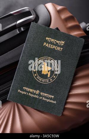 International passport of a citizen of Bangladesh on a suitcase ...