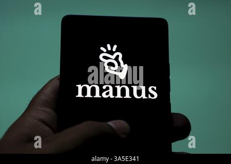 Close up of Manus logo on screen of mobile phone Stock Photo - Alamy