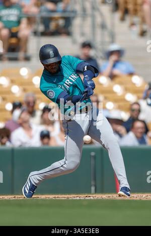 Seattle Mariners' Victor Robles (10) celebrates after scoring during ...