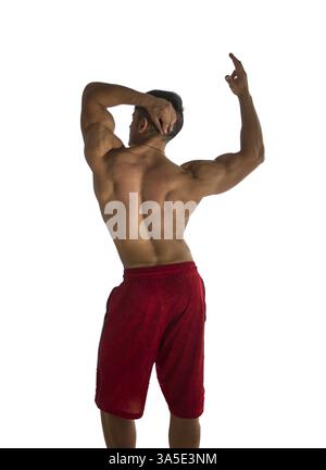 muscular man showing his back muscles Stock Photo - Alamy