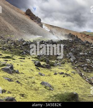 Rhyolite mountains smoldering underground heat. In the hollows lie ...