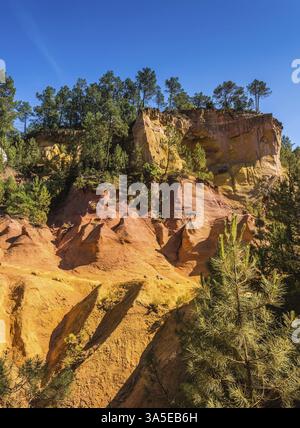 The ocher outcrops - from yellow to orange-red Stock Photo - Alamy