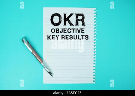 OBJECTIVES text written on blue-black round grungy stamp sign Stock ...