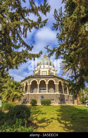 Israel, Sea of Galilee Beach. Dome and colonnade surrounded by a park ...