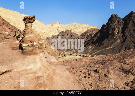 Geological formation of colorful stones with different layers, yellow ...