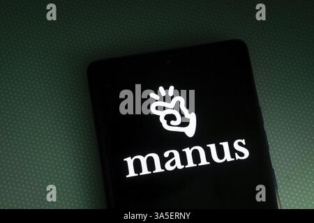Close up of Manus logo on screen of mobile phone Stock Photo - Alamy