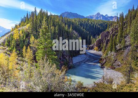 Shallow mountain stream with glacial melted water. Rocky Mountains of ...