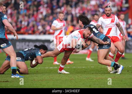 Hull KR's Jared Waerea-Hargreaves is tackled by Hull FC's Zak Hardaker ...