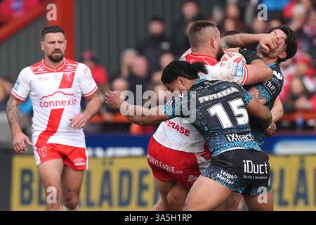 Hull KR's Jared Waerea-Hargreaves is tackled by Hull FC's Zak Hardaker ...