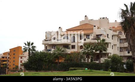 Alicante, Spain - March, 2025: View to apartment house with balconies ...