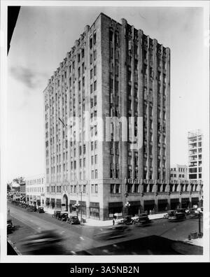 This image captures the Baker Building under construction, with a ...