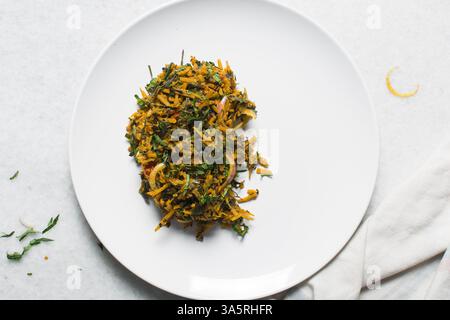 Overhead view of abacha or african salad in a white bowl, top view of ...