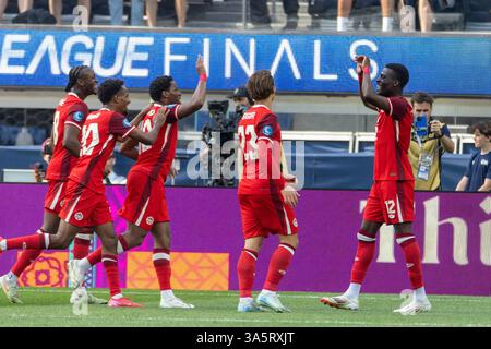 Canada's Tani Oluwaseyi (12) celebrates his goal against Honduras, with ...