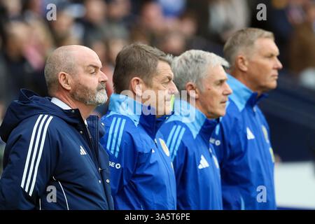Scotland manager Steve Clarke (left) with his coaching staff sing ...