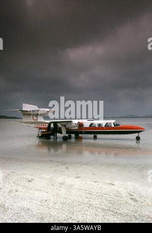 Loganair Britten-Norman Trislander on the Isle of Barra beach airport ...