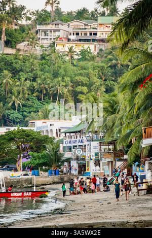 Come evening the beach comes alive with fish sellers and ad hoc ...