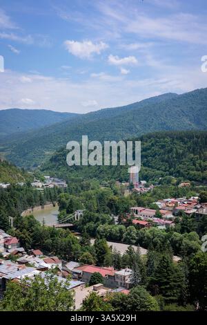 Summer river flowing among green hills and fields. Tovtry National Park ...