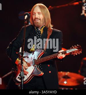 Tom Petty and the Heartbeakers perform during the halftime show of ...