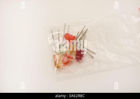 Multi-colored LEDs. Old LEDs on a white background Stock Photo - Alamy