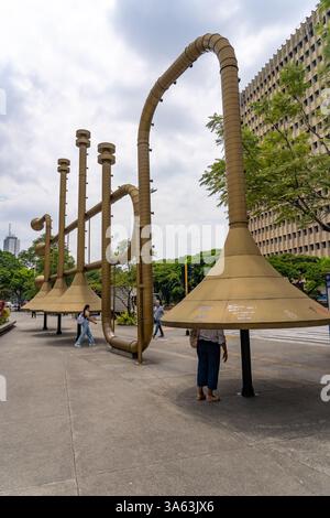 The Las Trompetas sculpture in the Plazoleta Jairo Varela is a landmark ...
