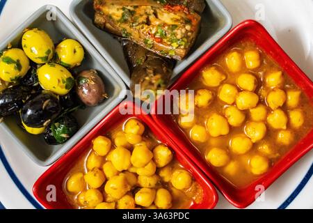 dish with chickpeas, olives and eggplant, typical Moroccan tapa,Tangier ...
