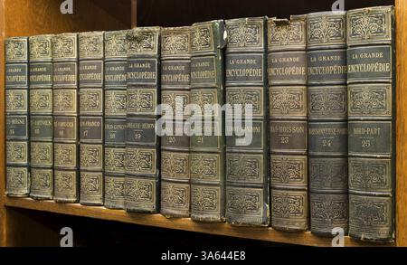 Old books on shelf. French encyclopedia. Close up shot Stock Photo - Alamy