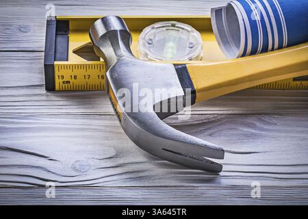Claw hammer blue rolled engineering drawings construction level on ...