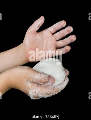 Isolated lathered hands and soap Stock Photo - Alamy