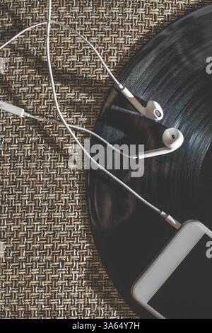 Smartphone and vintage LP. Close up Stock Photo - Alamy