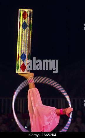 circus performers unicycle Stock Photo - Alamy