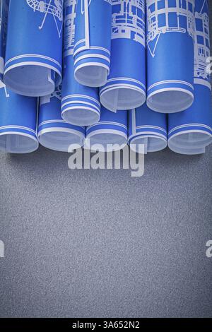 Composition of blue engineering drawings on grey background ...