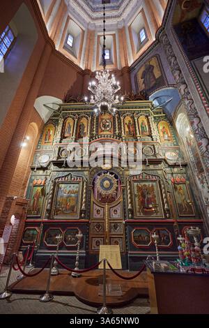The iconostasis decorated with icons and religious paintings inside the church of the Greek ...