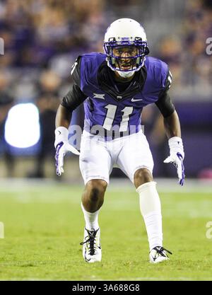 TCU cornerback Ranthony Texada (11) tackles Oklahoma wide receiver ...
