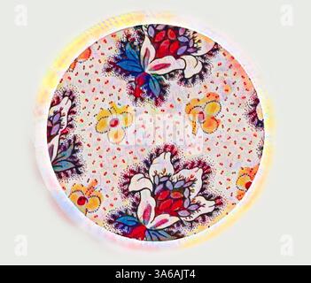 A circular fabric featuring a vibrant floral pattern, with swirling ...