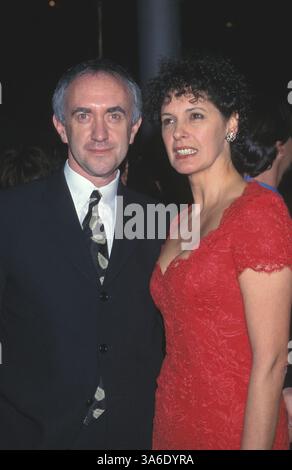 Actor JONATHAN PRYCE & wife KATE @ 'Tomorrow Never Dies' movie premiere ...