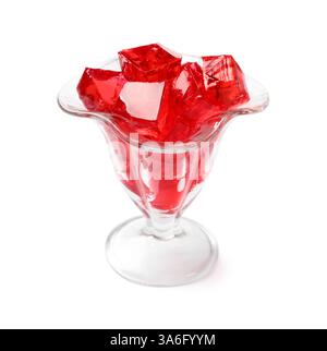 Glass with tasty jelly cubes on white background Stock Photo - Alamy