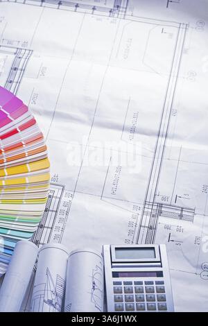 Blueprints and color palette with calculator Stock Photo - Alamy