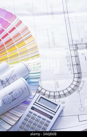 Color palette and blueprints with calculator Stock Photo - Alamy